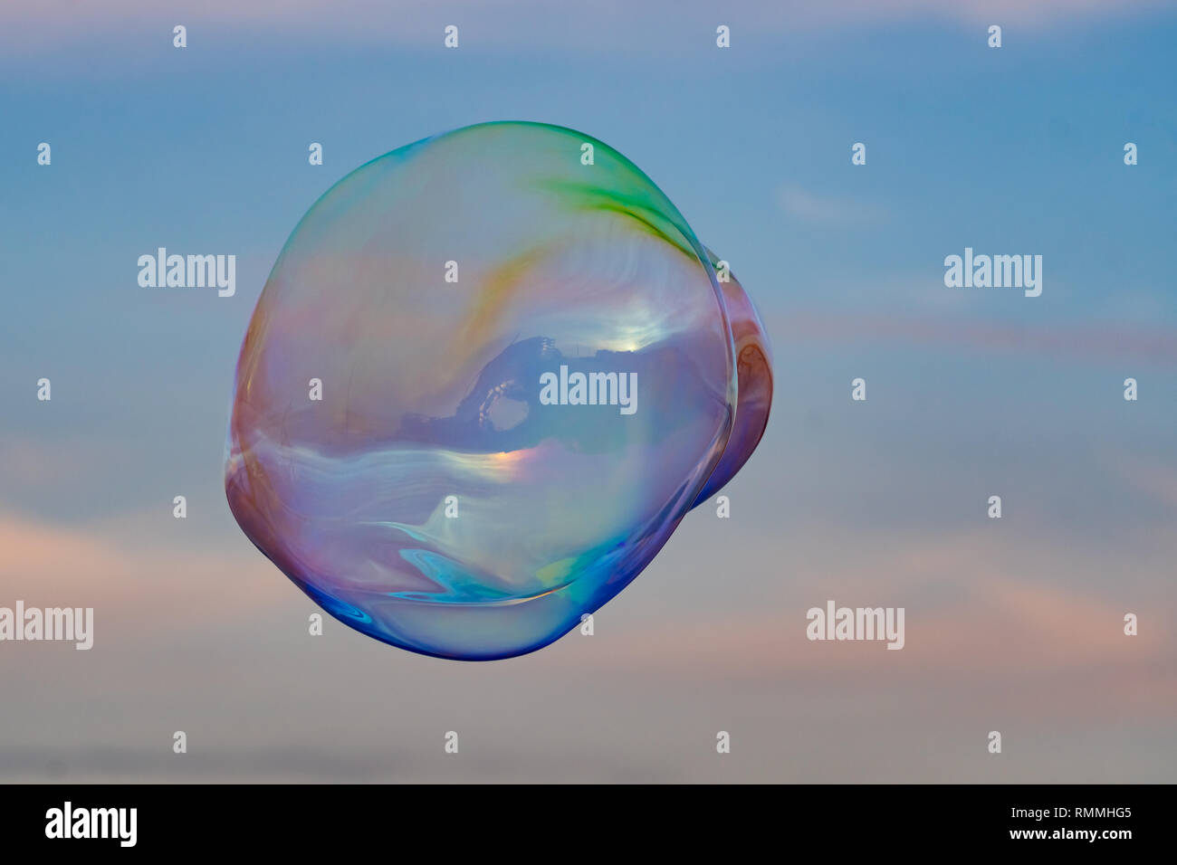 Soap bubble floating in the air Stock Photo - Alamy