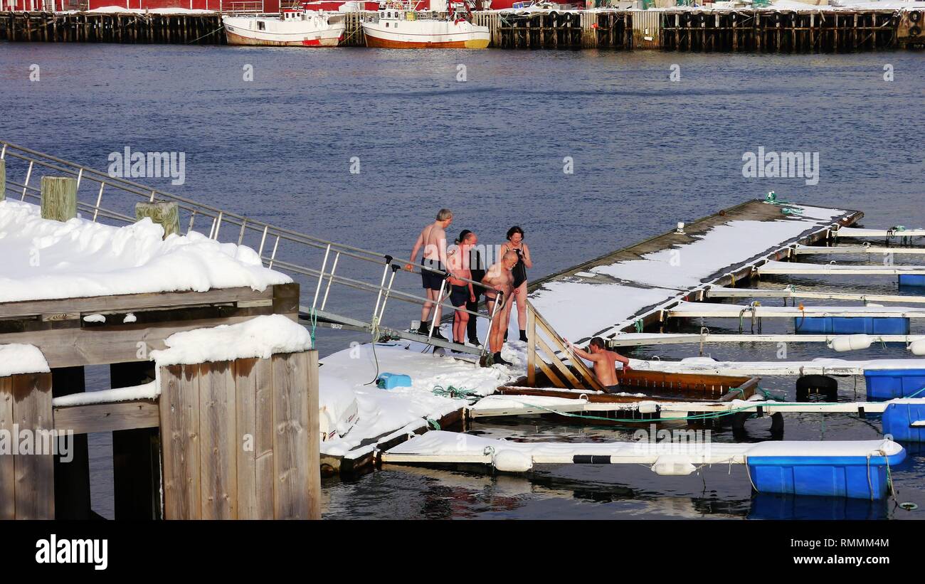Swimmers taking a dip in the Arctic Ocean in Winter, Norway Stock Photo ...