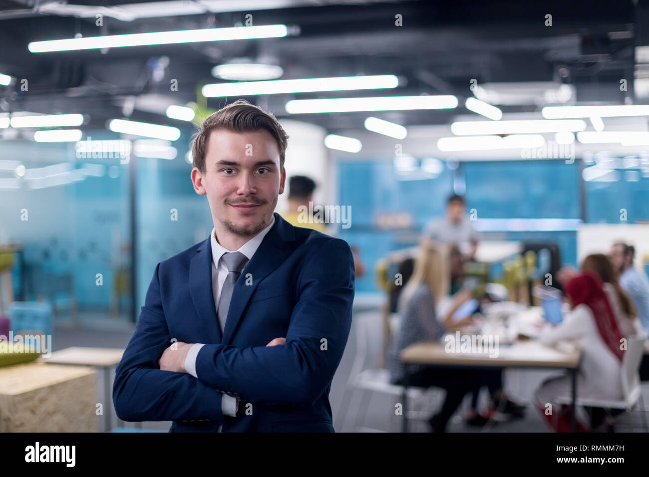 Portrait Of Successful Businessman Entrepreneur At Busy startup Office ...