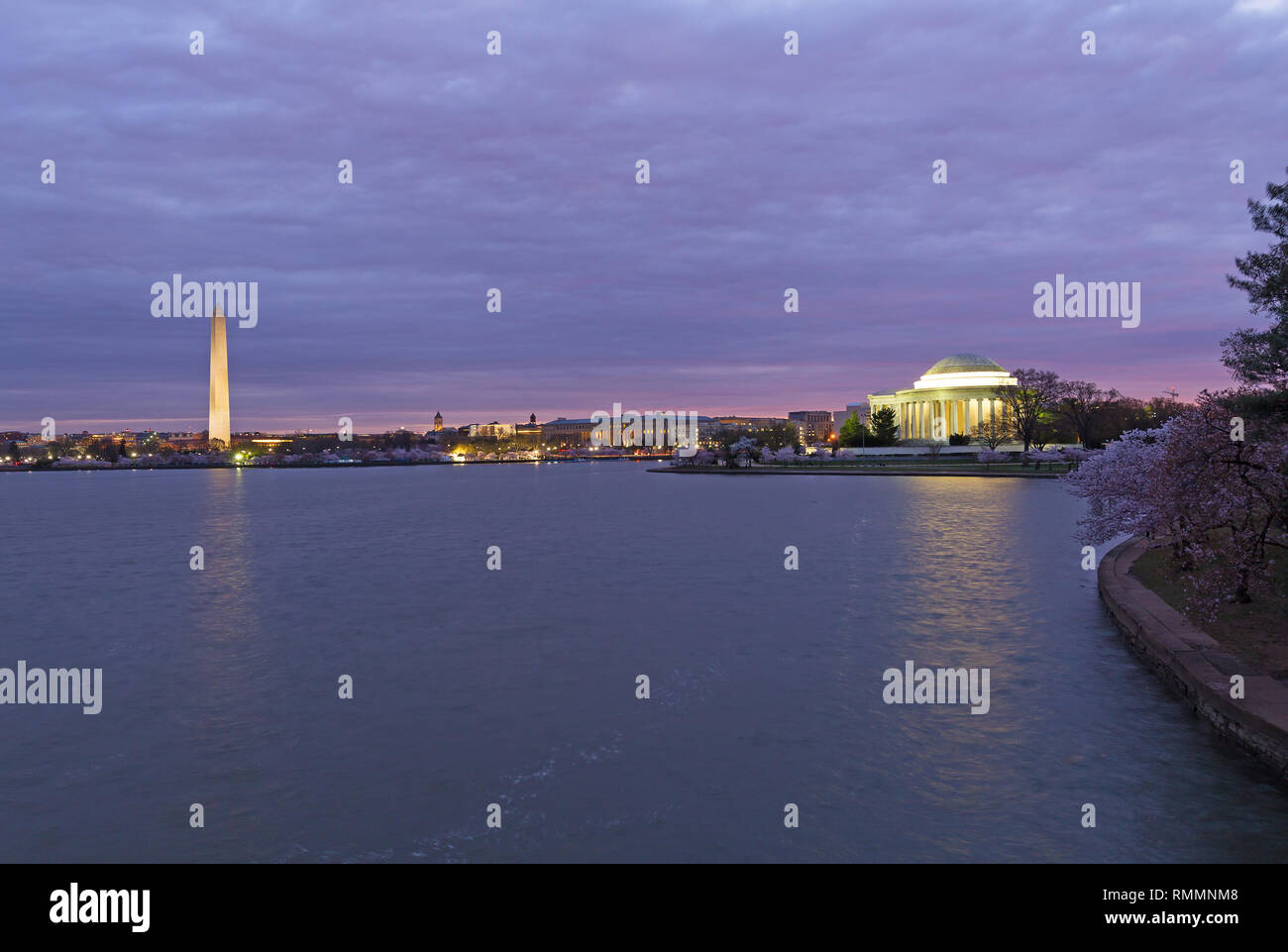 City historic monuments with reflection in dark waters at dawn ...