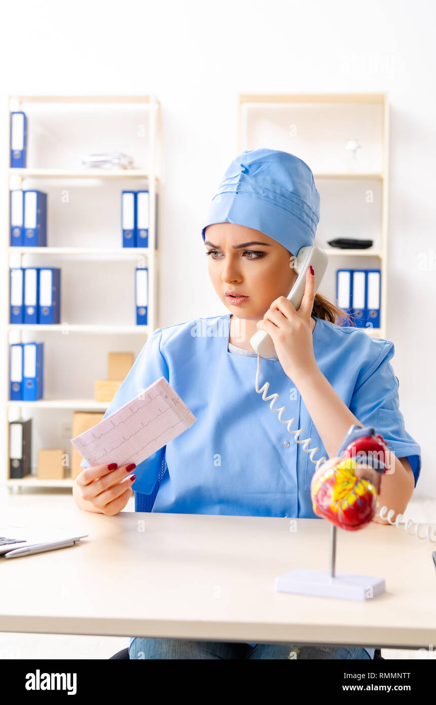 Female doctor speaking heart cardio hi-res stock photography and images ...