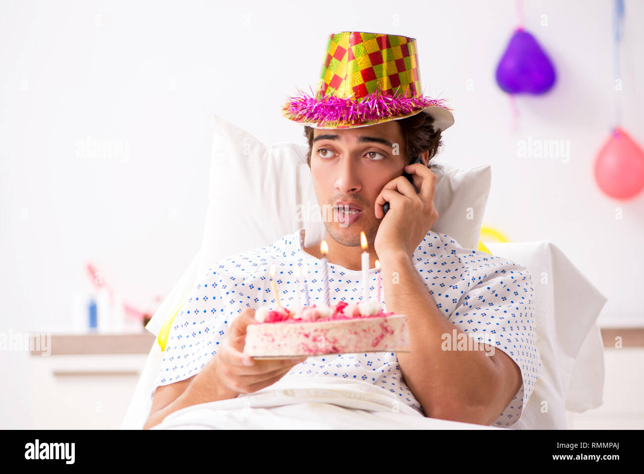 Young man celebrating his birthday in hospital Stock Photo - Alamy
