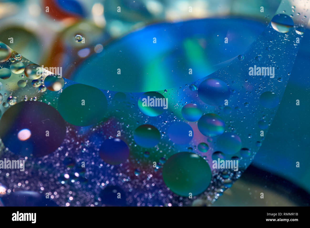 floating in the water abstract colorful oil drops Stock Photo - Alamy