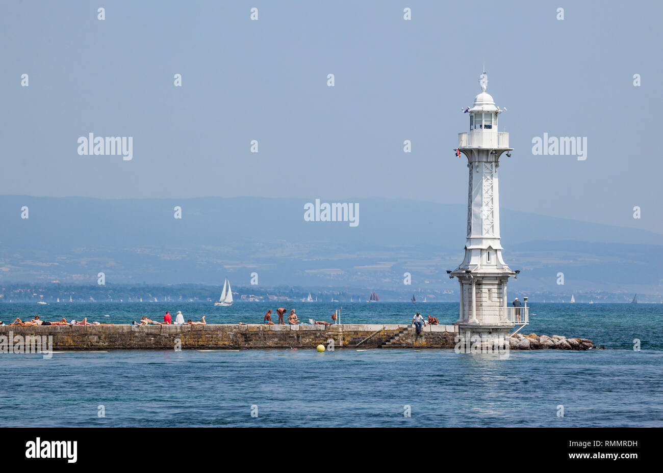 Switzerland, Lake Geneva, lighthouse at the entrance to the Port of ...