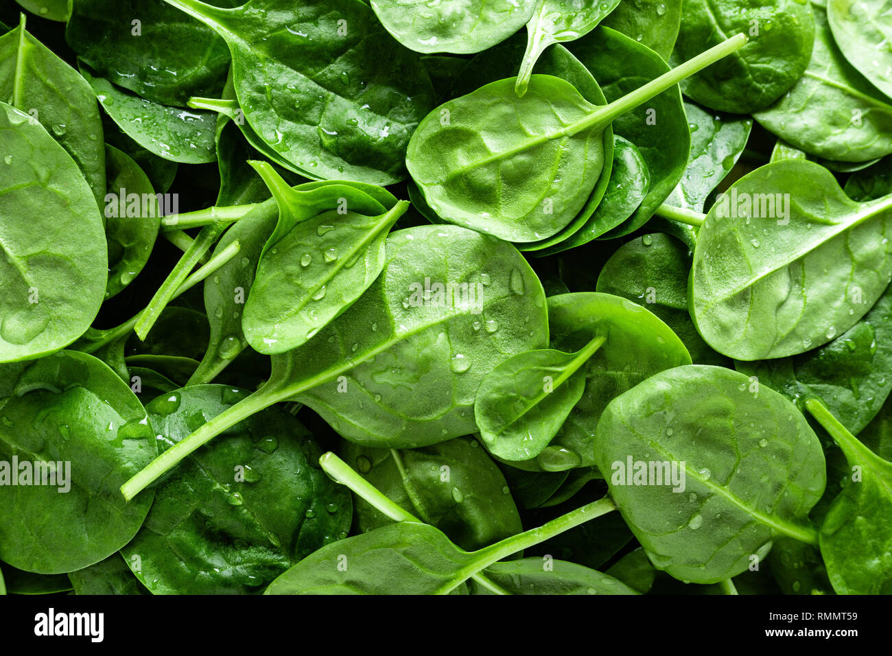 Fresh spinach leaves background. Healthy vegan food. Top view Stock ...