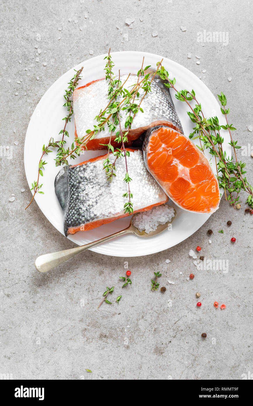 Fresh raw salmon fish steaks. Top view Stock Photo - Alamy