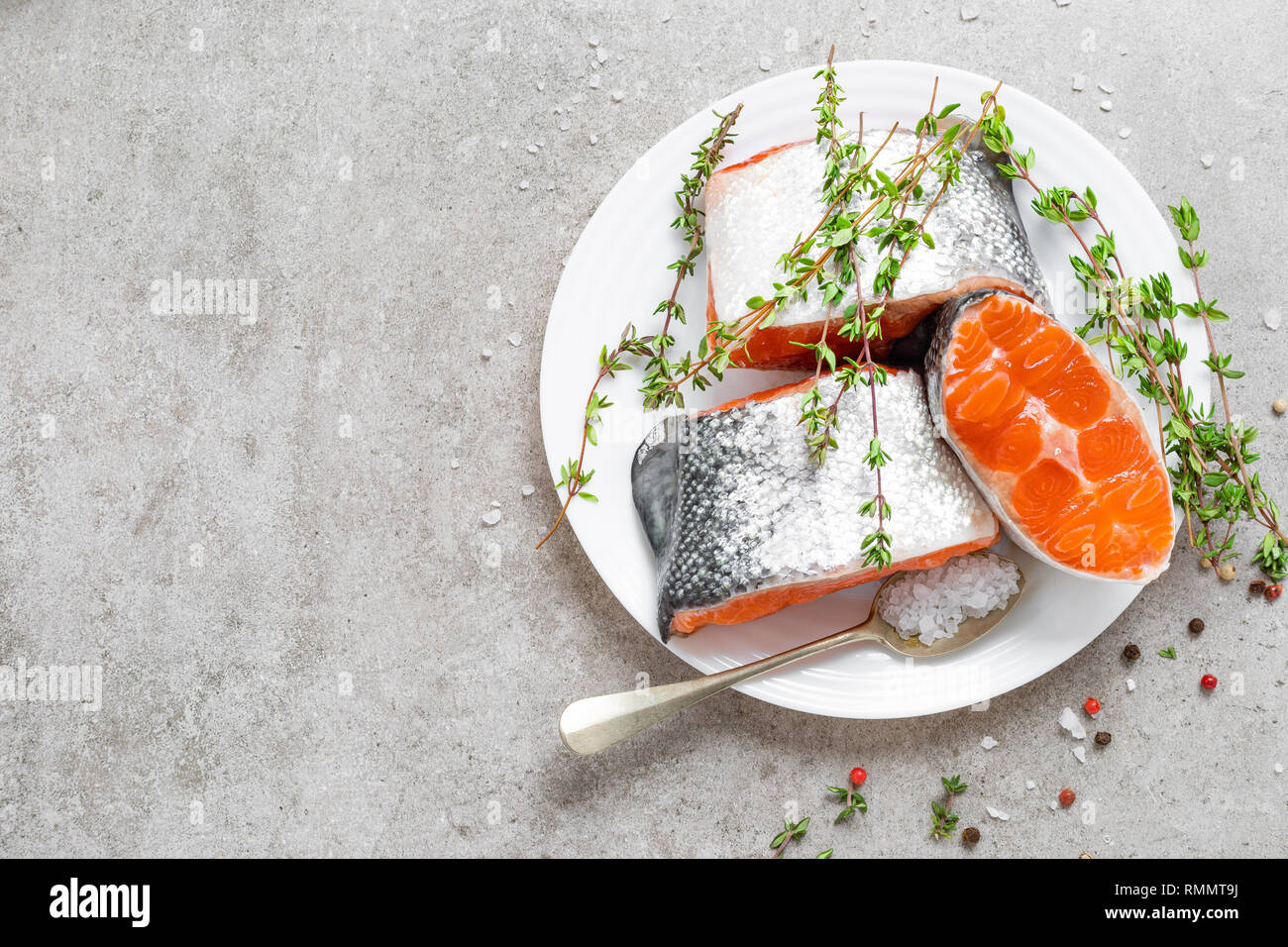 Fresh raw salmon fish steaks. Top view Stock Photo - Alamy
