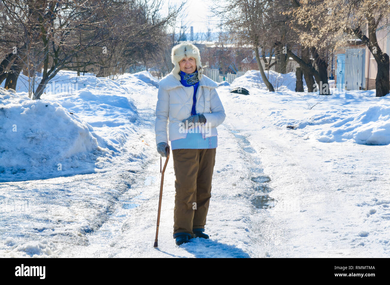 Old lady walking stick on hi-res stock photography and images - Alamy