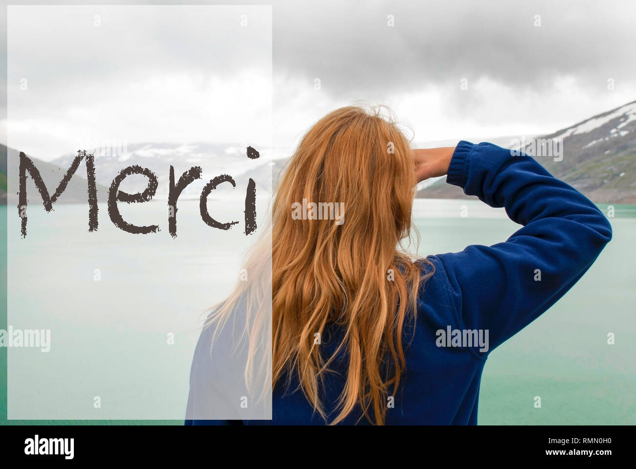French Text Merci Means Thank You. Caucasian Woman Enjoys The View To A ...