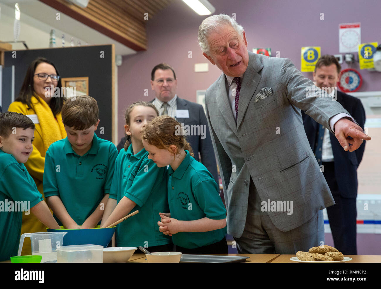 The Prince of Wales talks to school children during a visit to ...