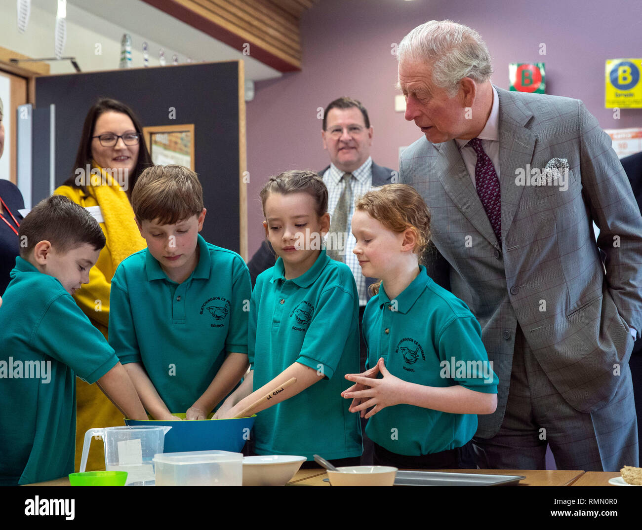 The Prince of Wales talks to school children during a visit to ...