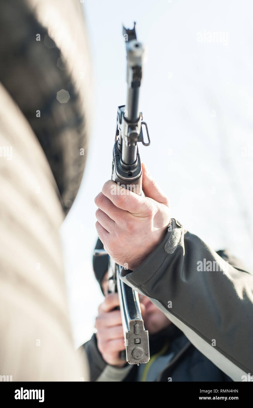 Rifle combat shooting training from behind and around cover or ...