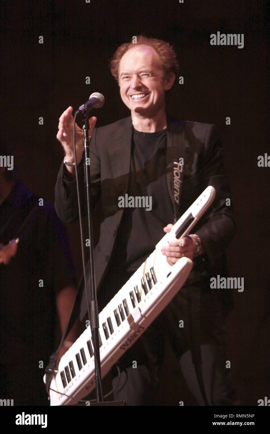 Musician Gary Wright is shown performing on stage during a "live ...