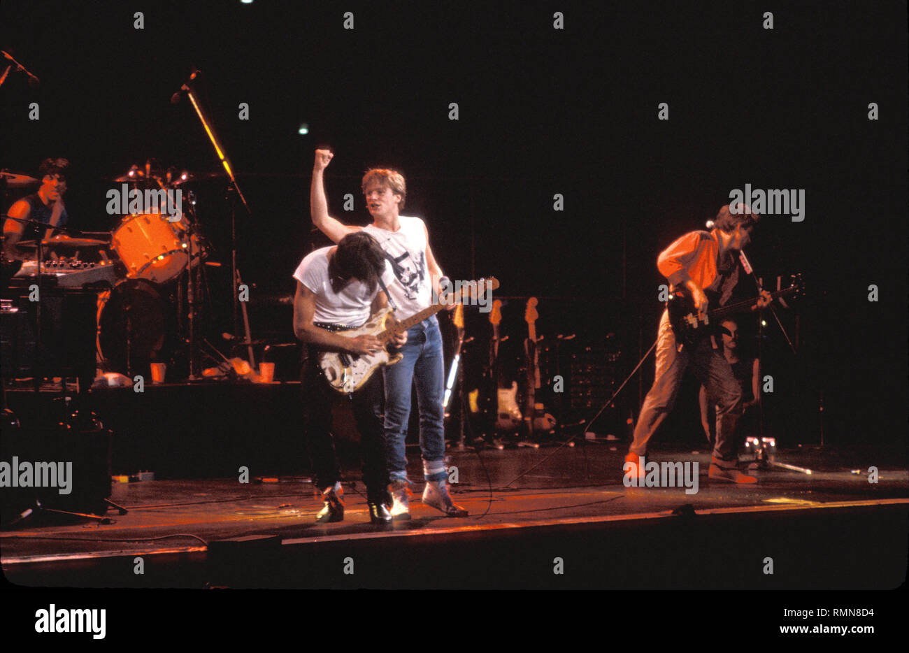 Musician Bryan Adams is shown performing "live" in concert Stock Photo ...