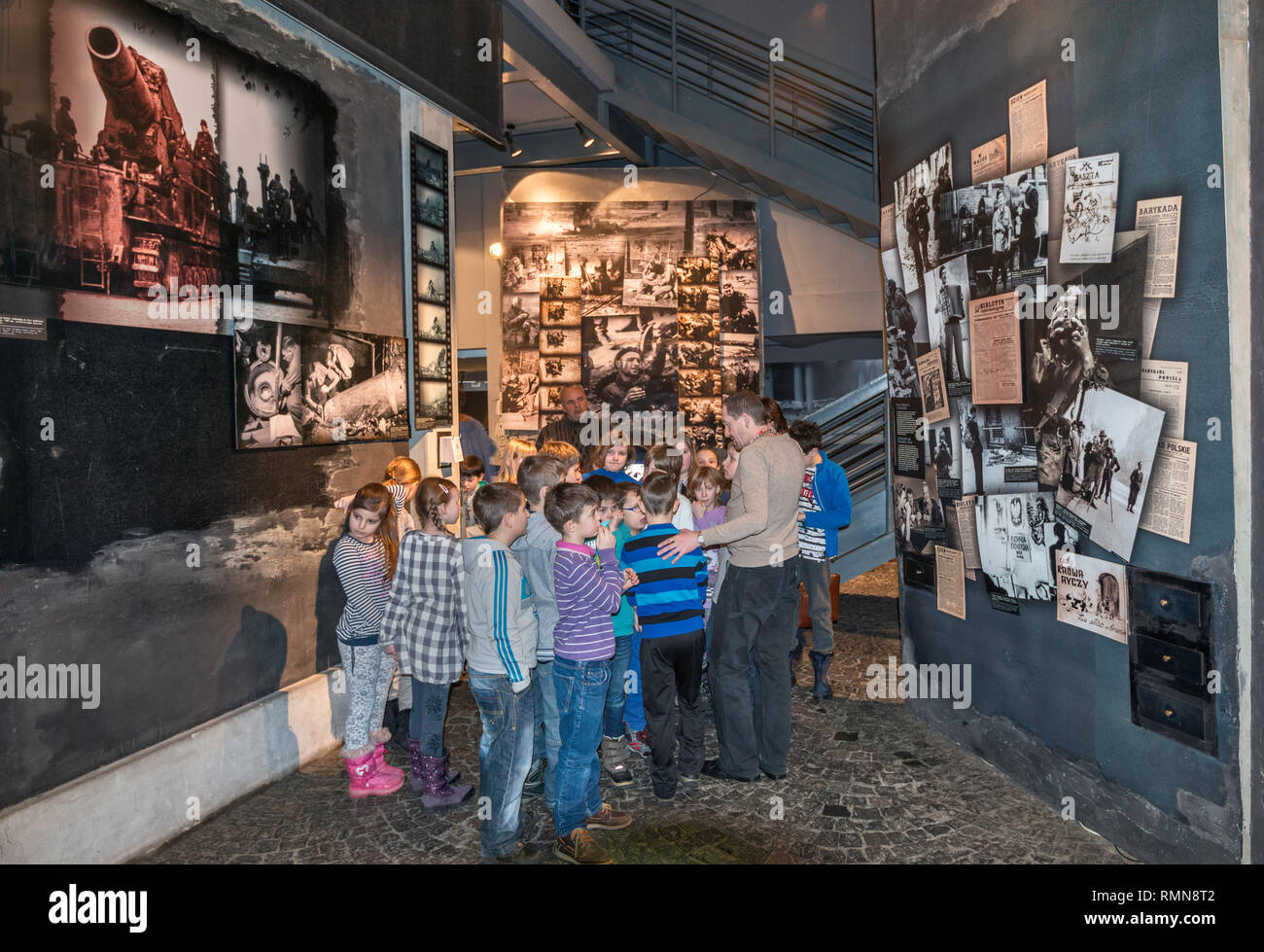 Children looking at displays at Warsaw Uprising Museum in Warsaw ...