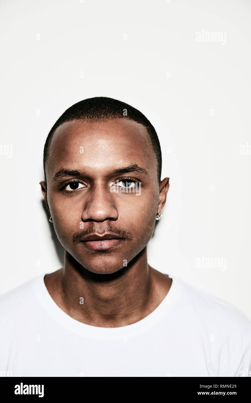 Young man dark hair portrait hi-res stock photography and images - Alamy