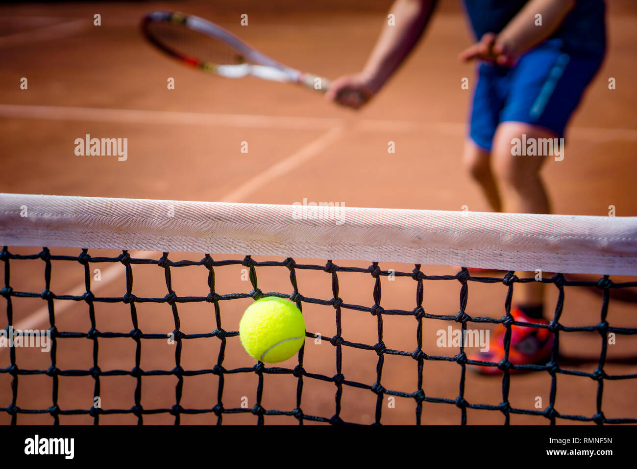Adult playing tennis hi-res stock photography and images - Alamy