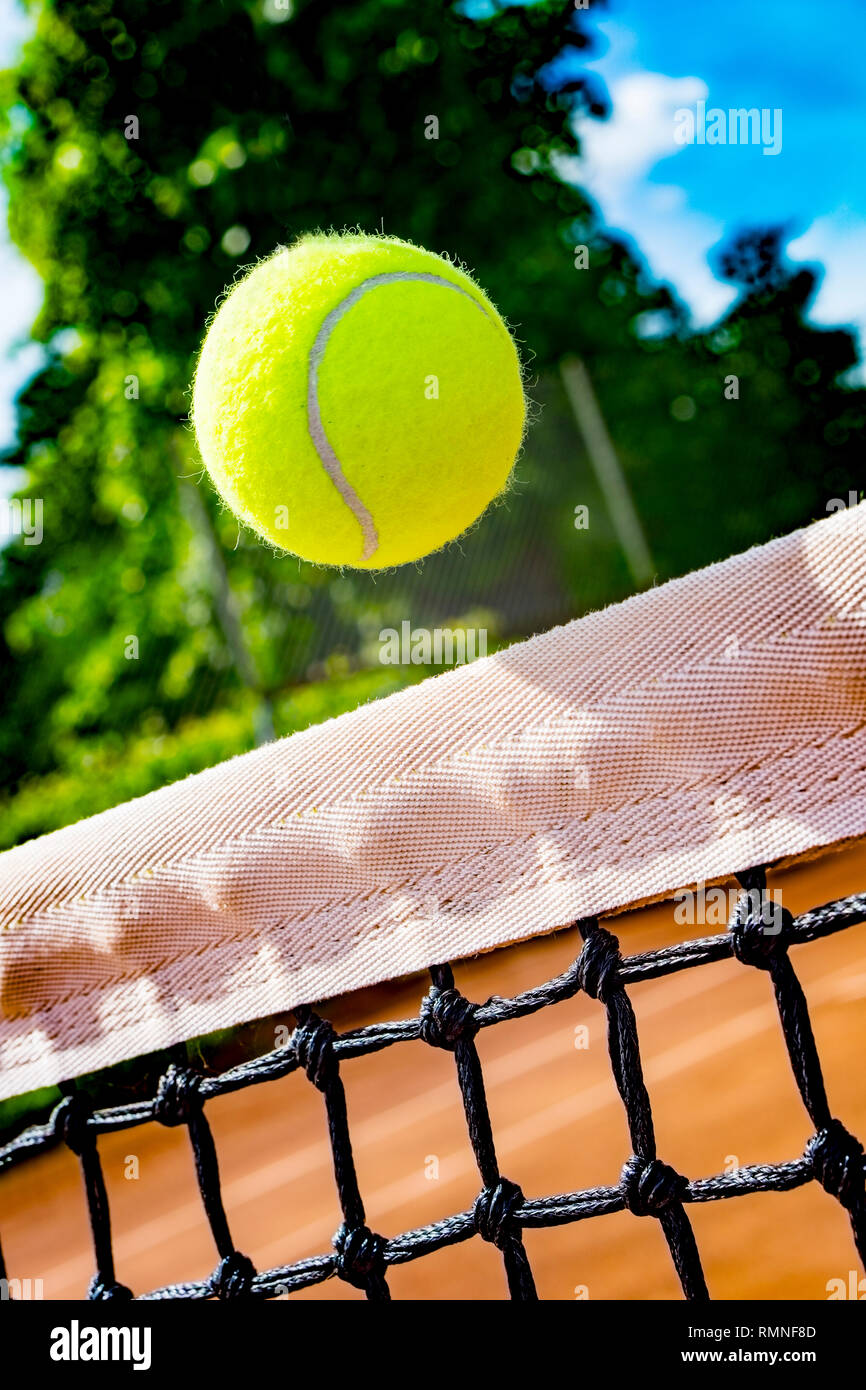 Net and tennis ball hi-res stock photography and images - Alamy