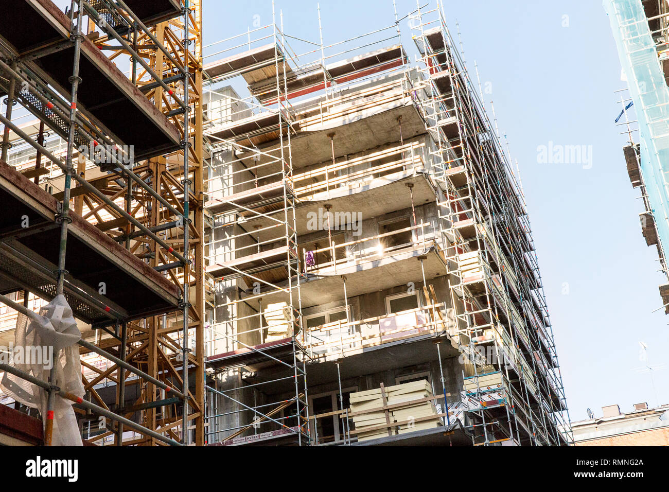Lifting building material hi-res stock photography and images - Alamy