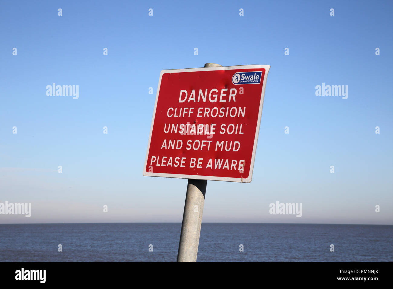 danger sign at warden point on the isle of sheppey kent england Stock ...