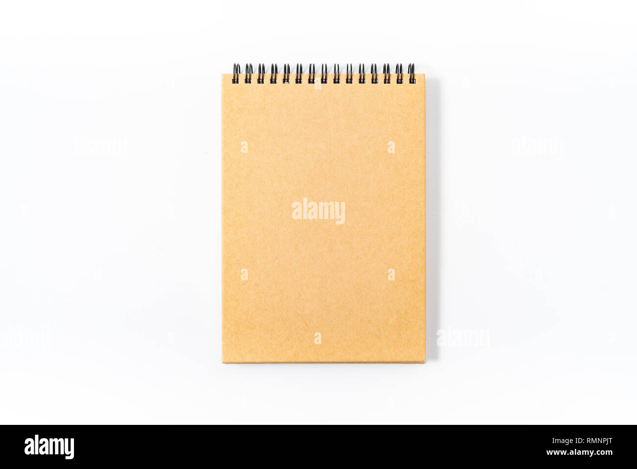 Brown spiral notebook isolated on white background.top view Stock Photo ...