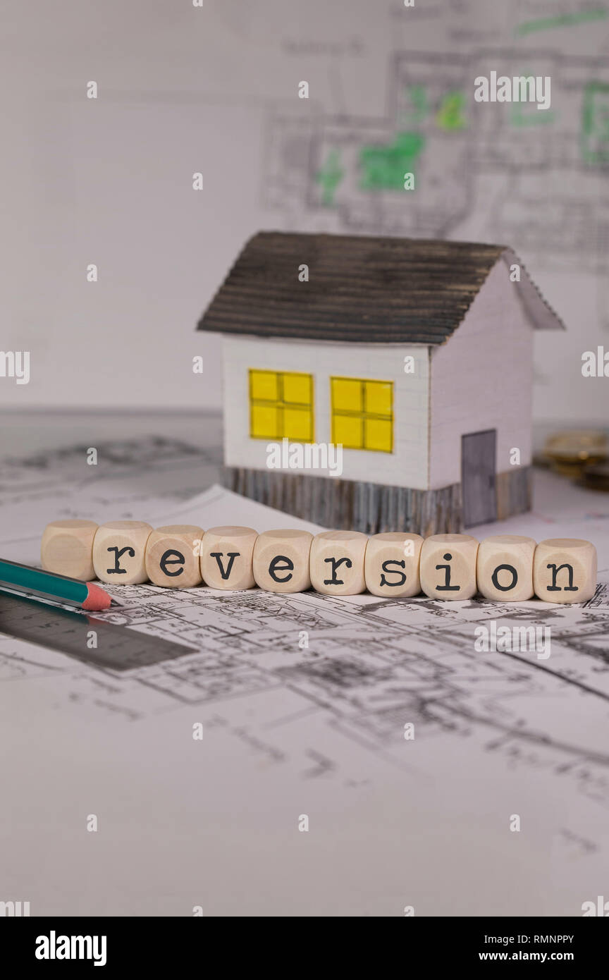 Word REVERSION composed of wooden letters. Closeup Stock Photo - Alamy