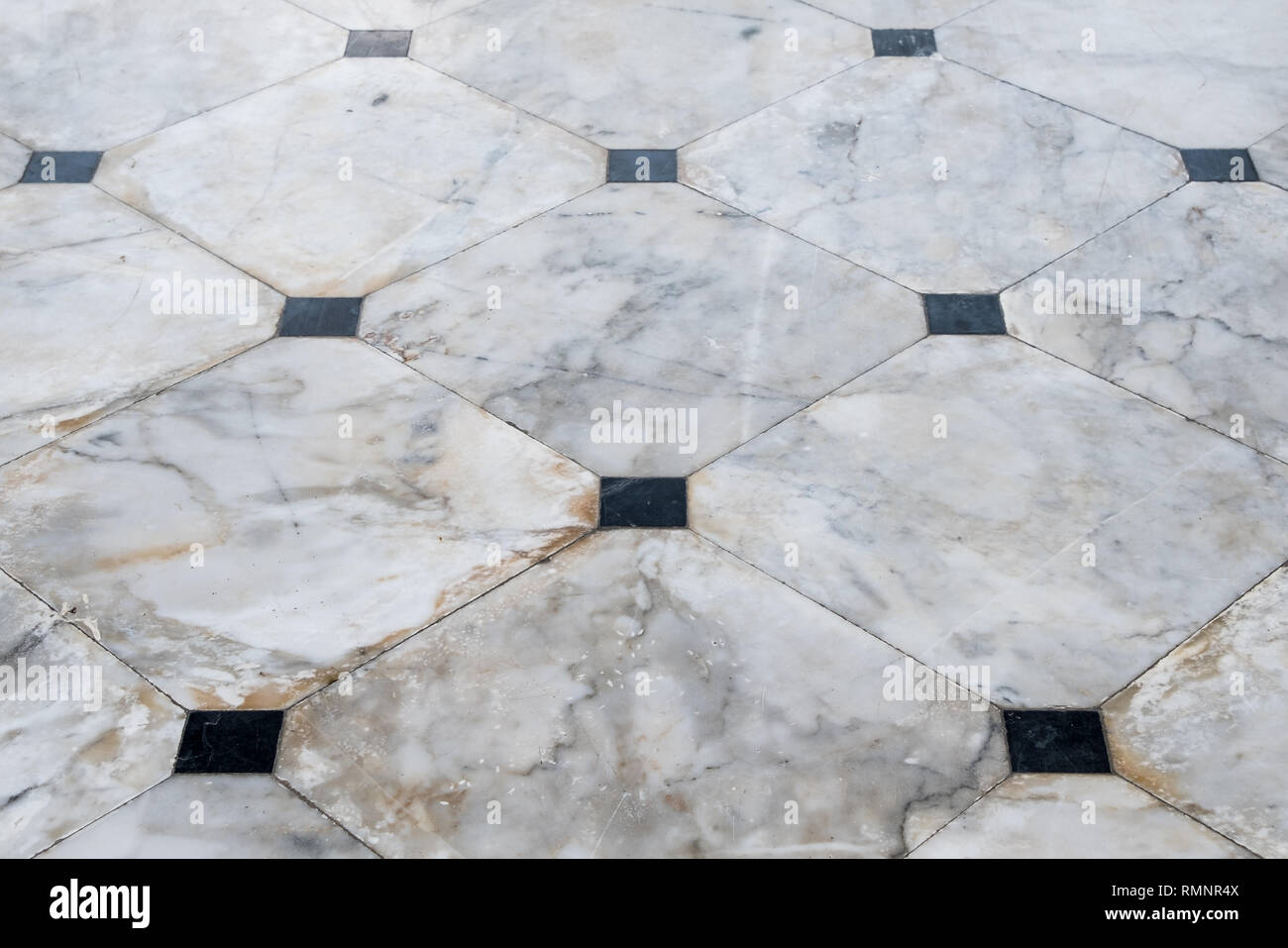 Marble tile floor with the black block for decorated in the living room ...