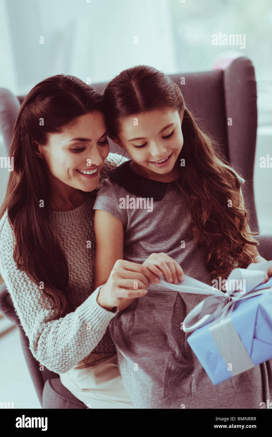 Specially for you. Portrait of adorable little girl sitting on her ...