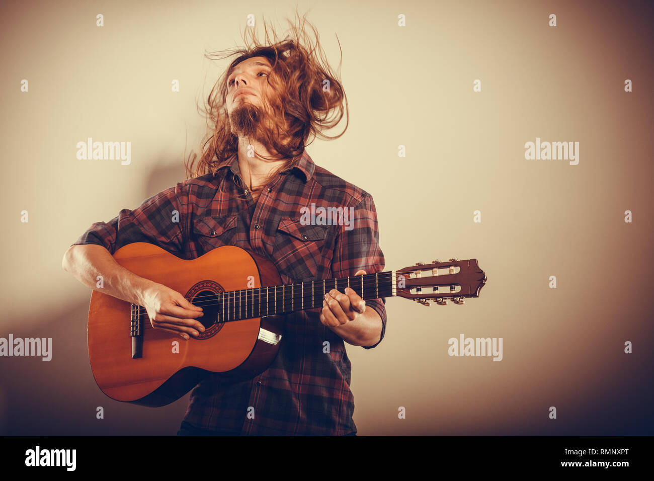 Music hobby passion concept. Enthusiast playing the instrument ...