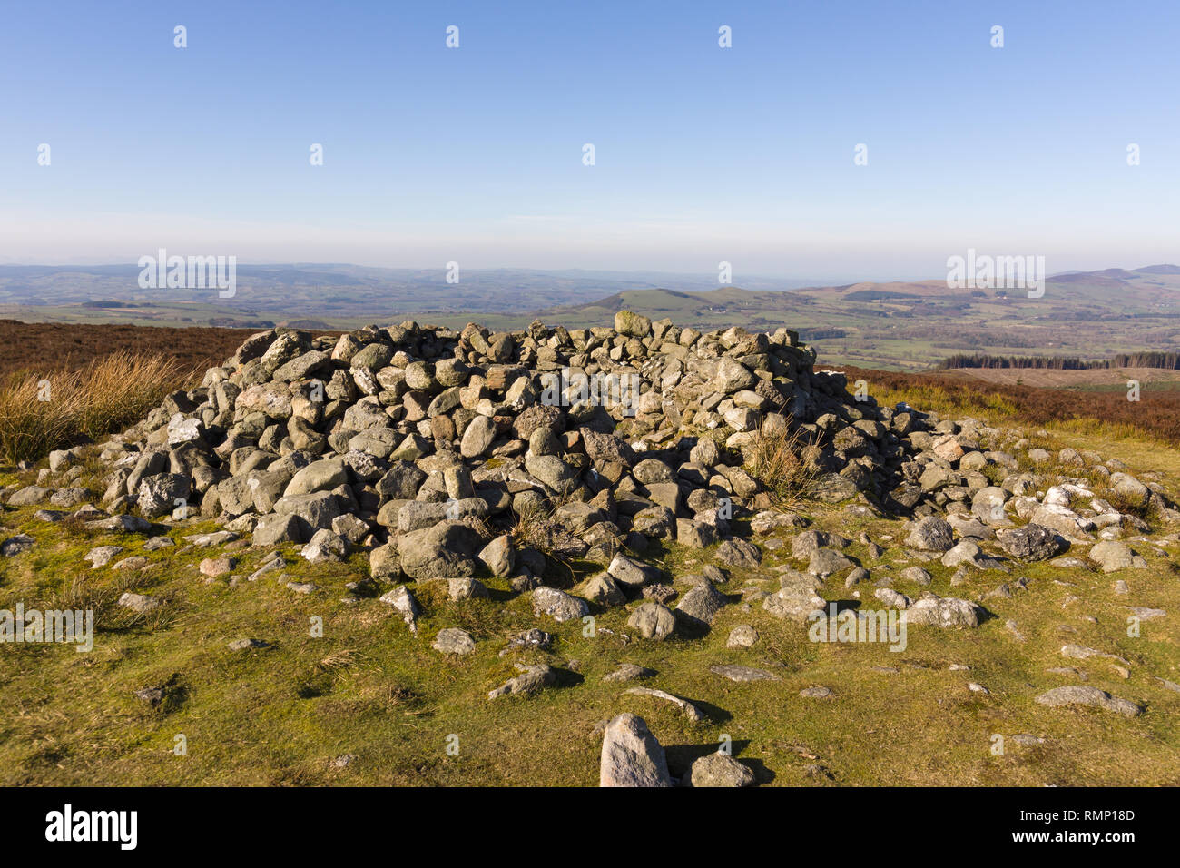 Stone cairn on Cyrn y Brain in the Clwydian Hills above the Horseshoe ...