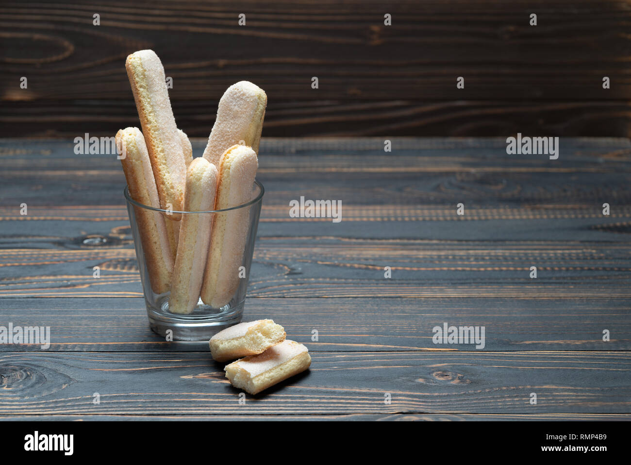 Traditional Italian Savoiardi ladyfingers Biscuits in glass on wooden ...
