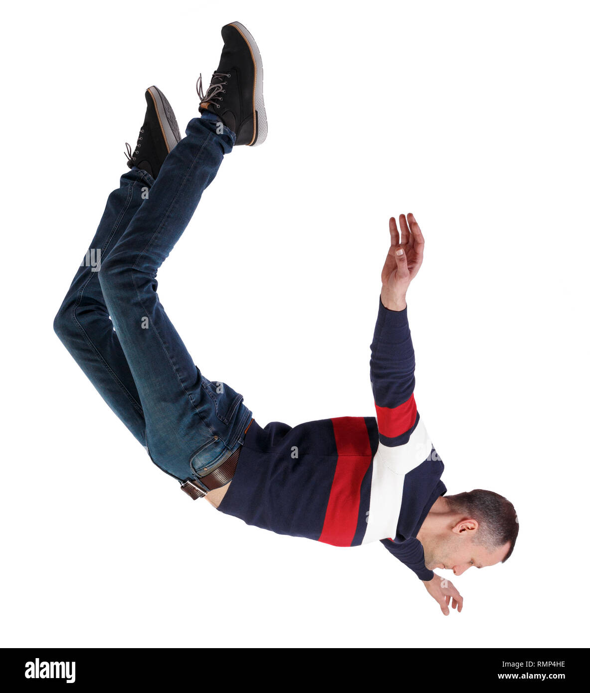 Side view of man in zero gravity or a fall. guy is flying, falling or ...