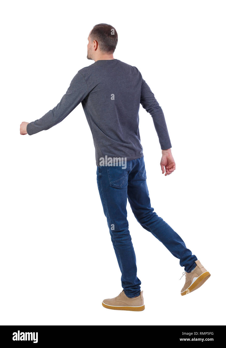 Side view of going handsome man . walking young guy . Rear view people ...