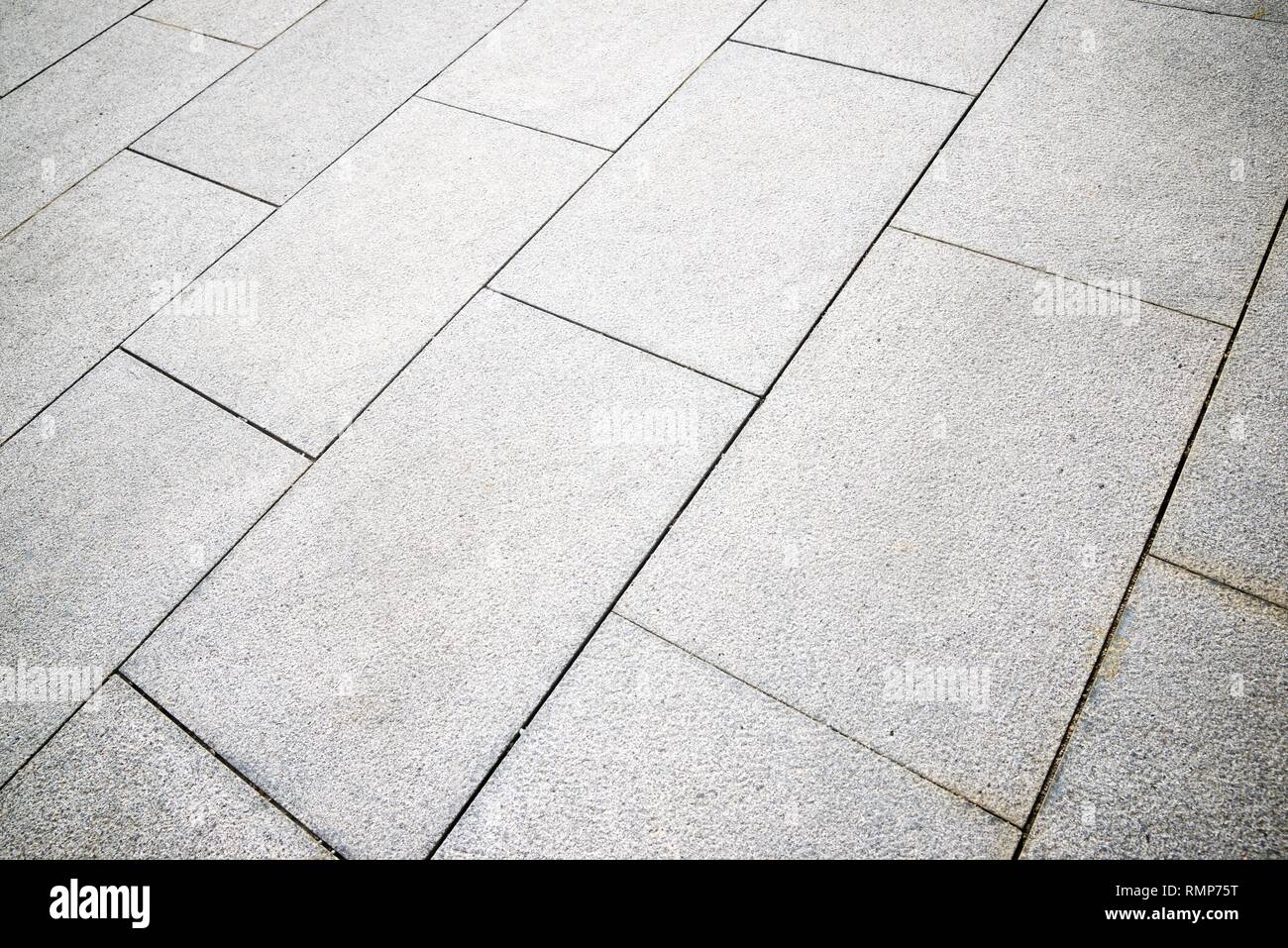 Floor of a street with stone tiles Stock Photo - Alamy