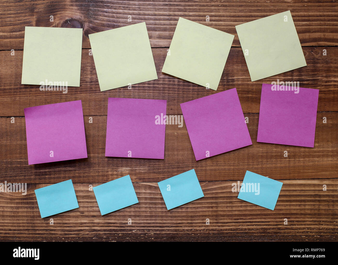 Wooden board with note stickers Stock Photo - Alamy