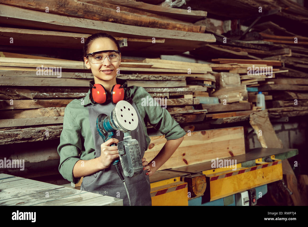 Woman working with timber hi-res stock photography and images - Alamy