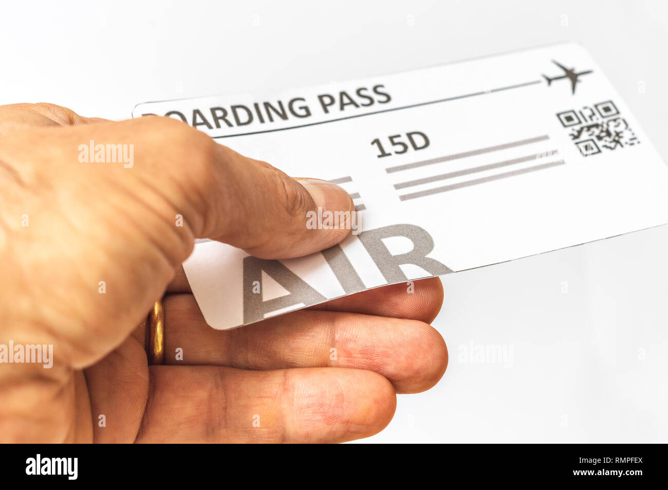 Closeup of a hand giving a boarding pass over white background Stock ...