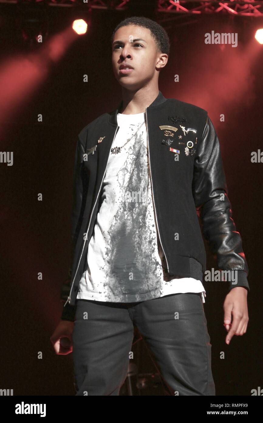 Singer Diggy Simmons is shown performing on stage during a "live ...