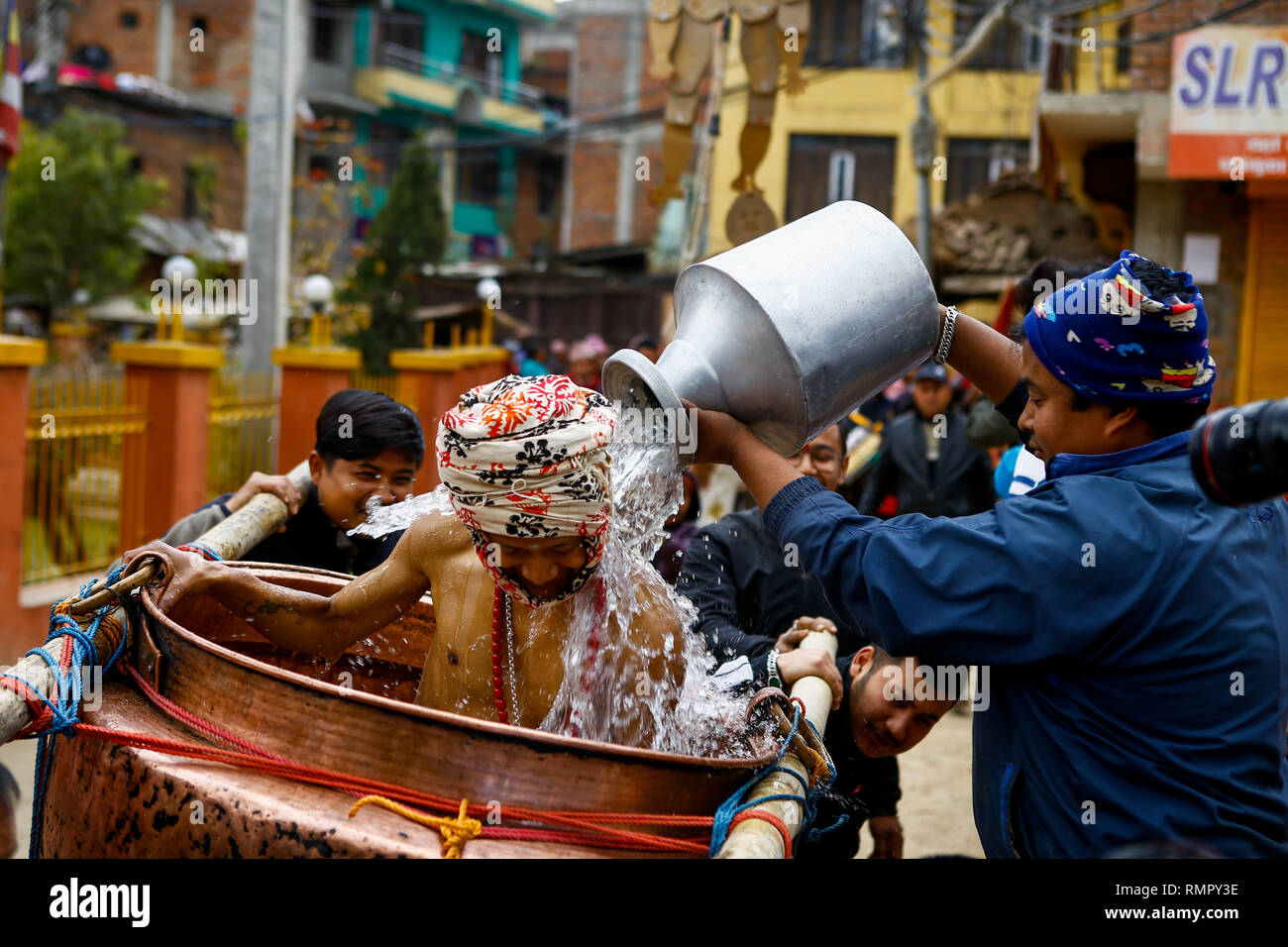 Man seen offering water hi-res stock photography and images - Alamy