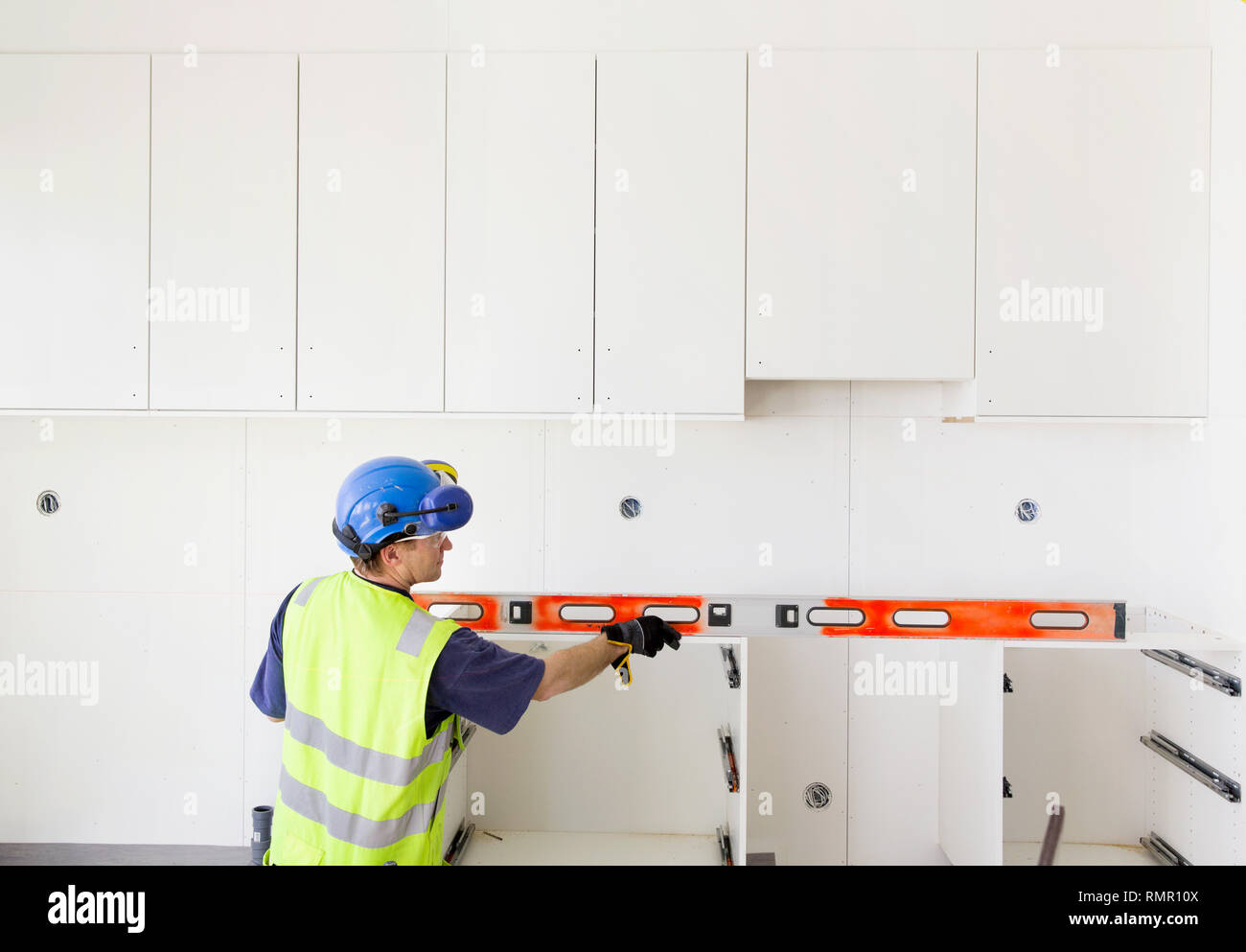 Builder at work Stock Photo - Alamy
