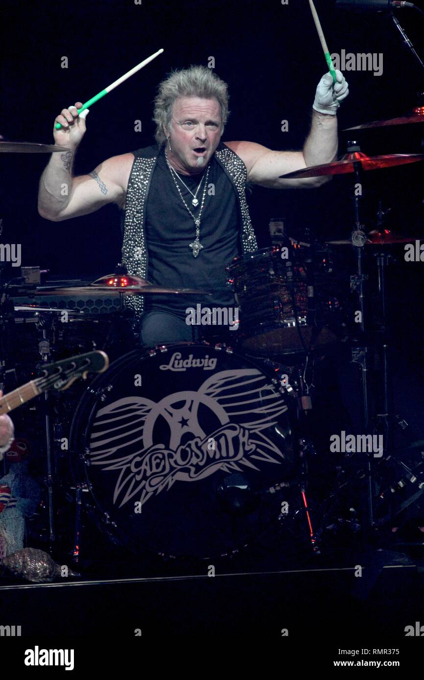 Drummer Joey Kramer is shown performing on stage during a "live ...