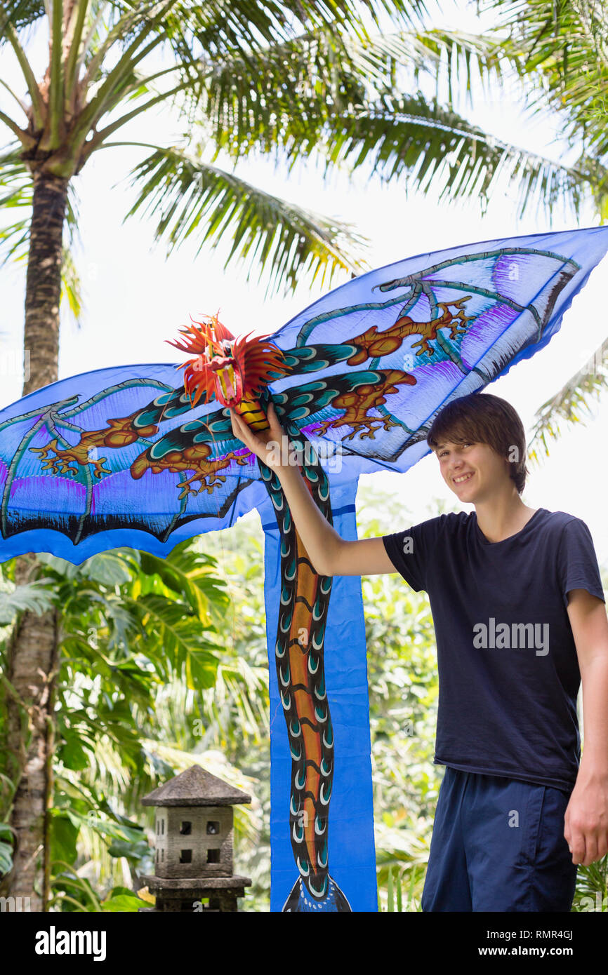 Teenage boy with kite Stock Photo - Alamy