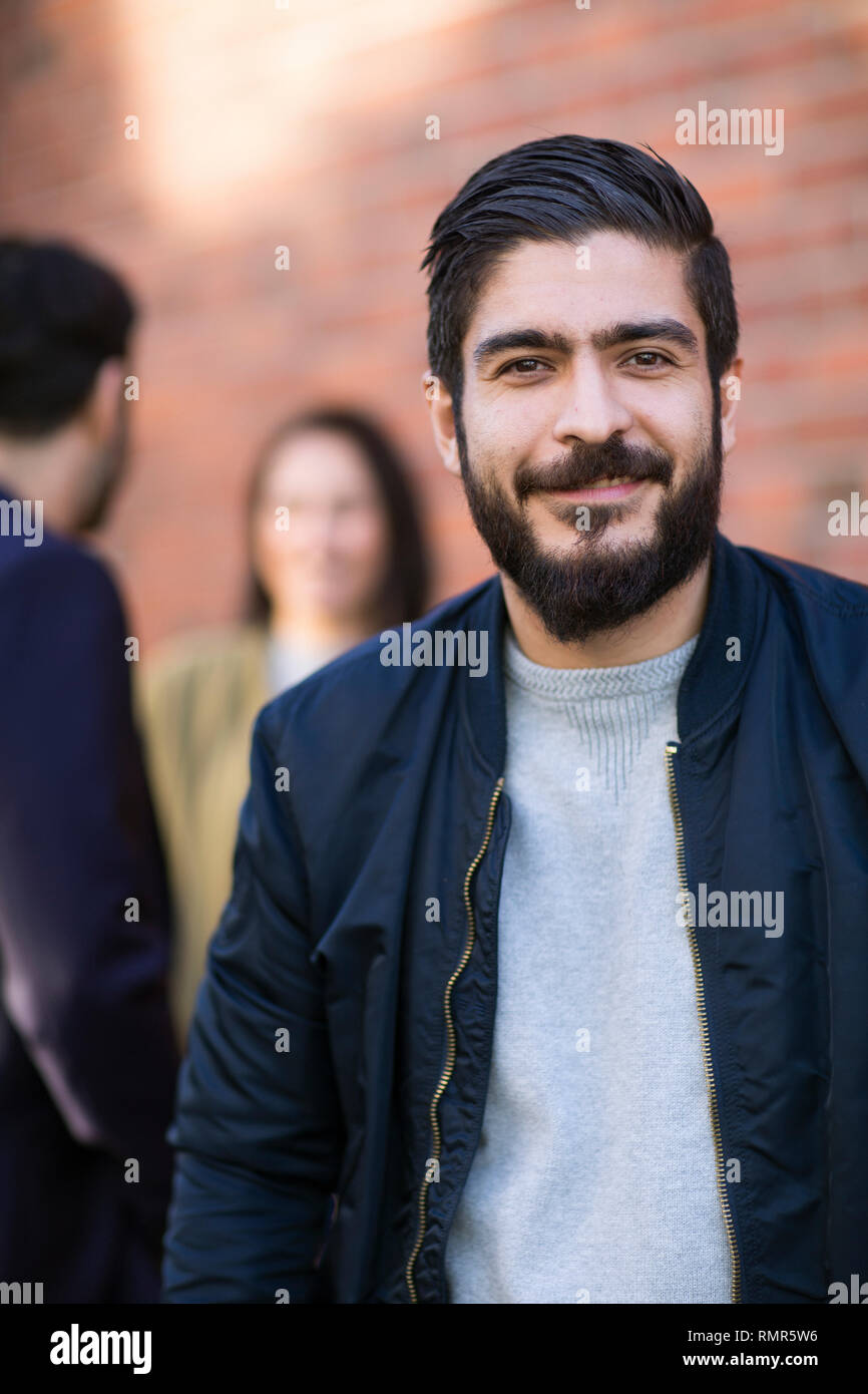 Adult men smiling hi-res stock photography and images - Alamy