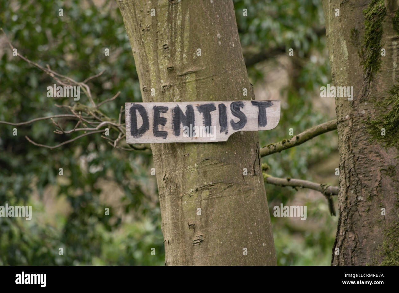 hand painted dentist sign Stock Photo - Alamy