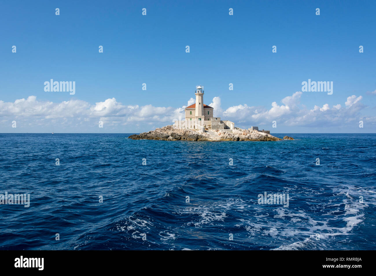 Mulo lighthouse in Croatia on small rocky island Stock Photo - Alamy