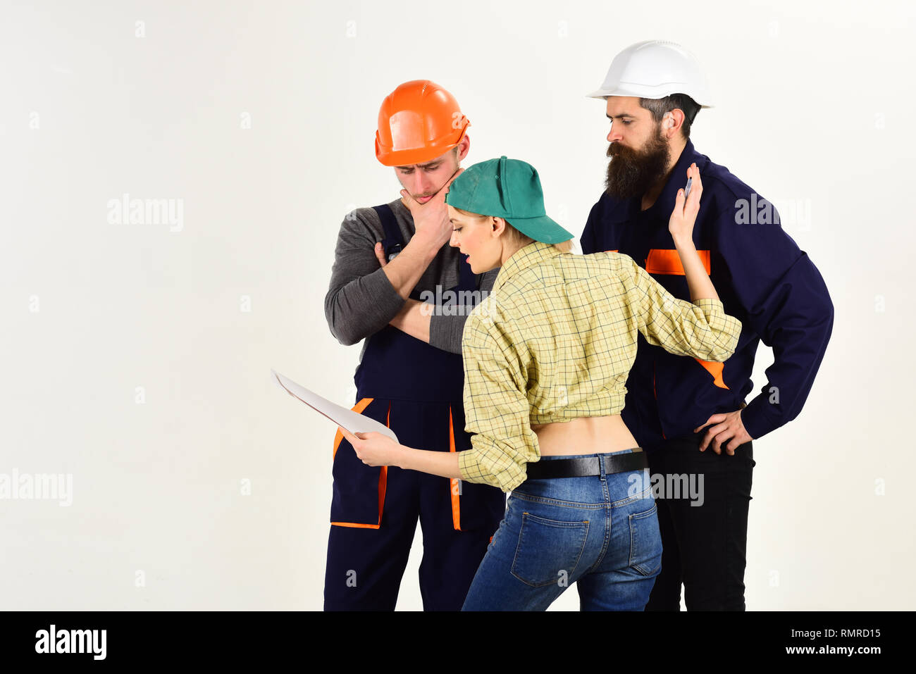 Discussing a new project. Group of constructing engineers and ...