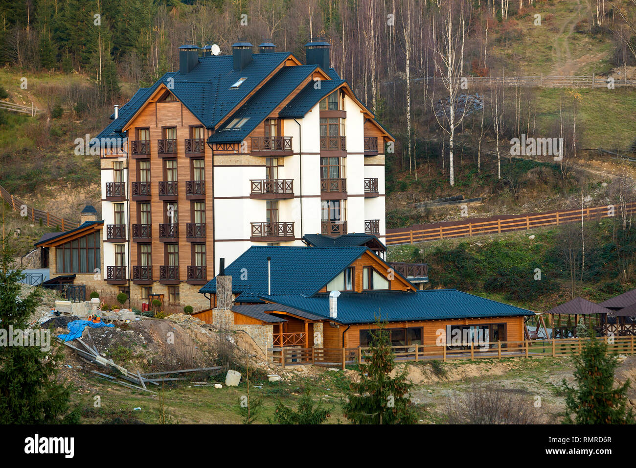 New modern comfortable four-story hotel building with attached premises ...