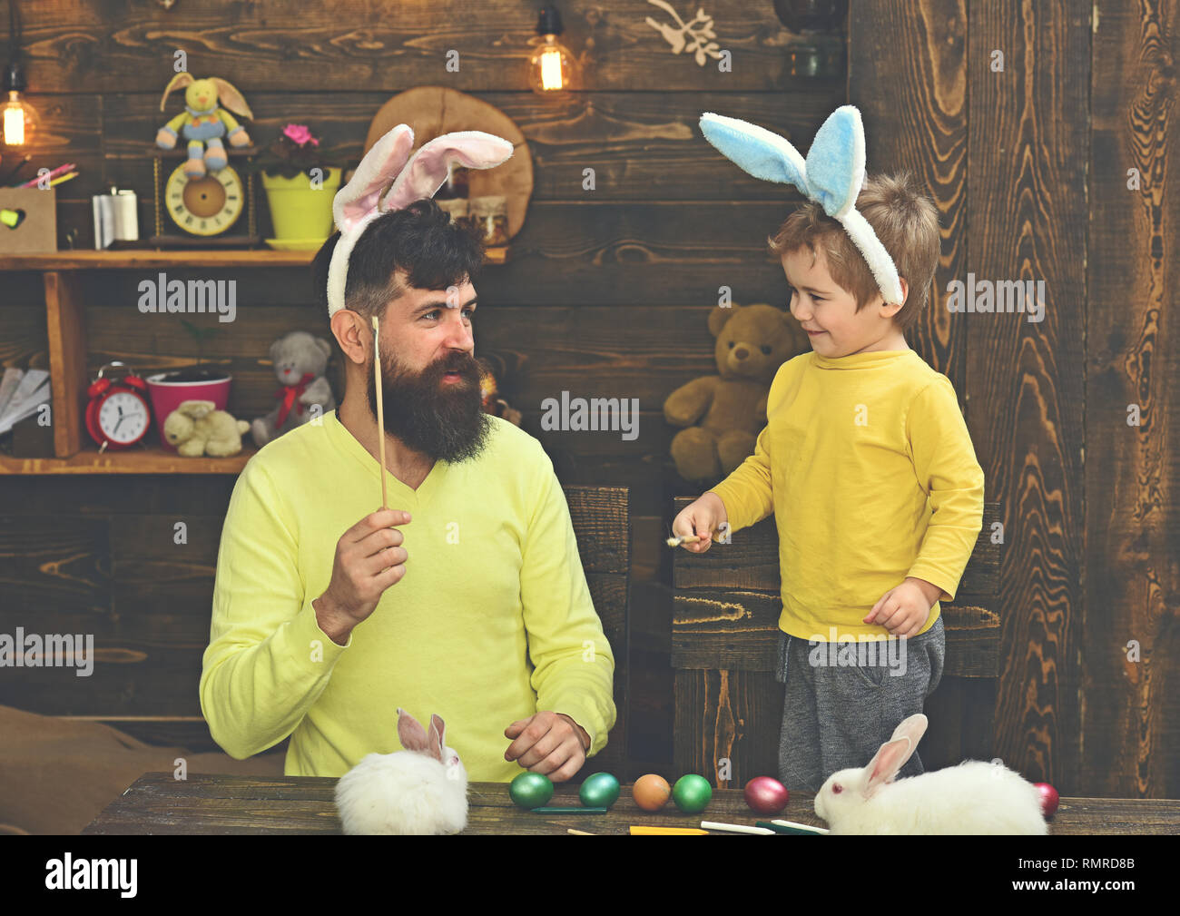 Easter family with fake bunny ears Stock Photo - Alamy