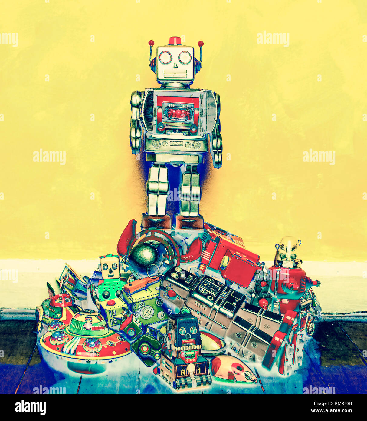 robot toy stands on the oppresed solarized color Stock Photo - Alamy