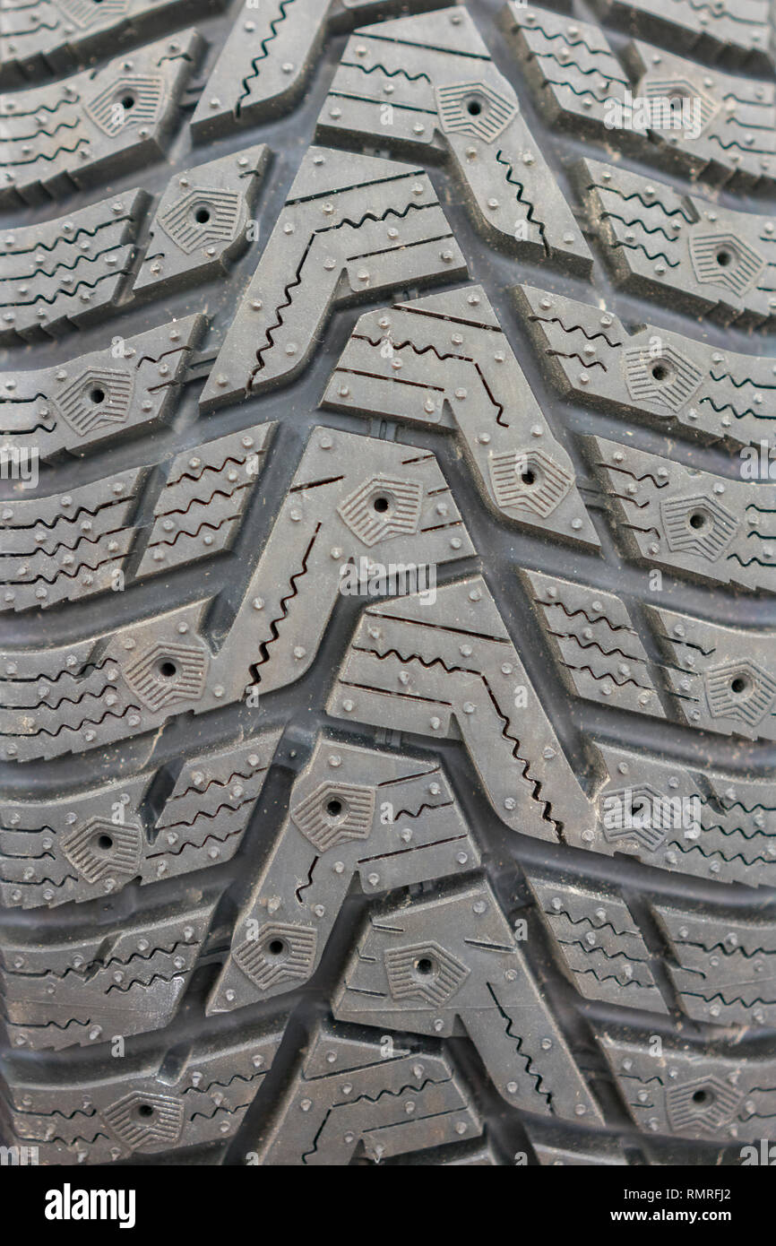 Close-up winter tire tread. Textured tire tread. Part of brand new ...